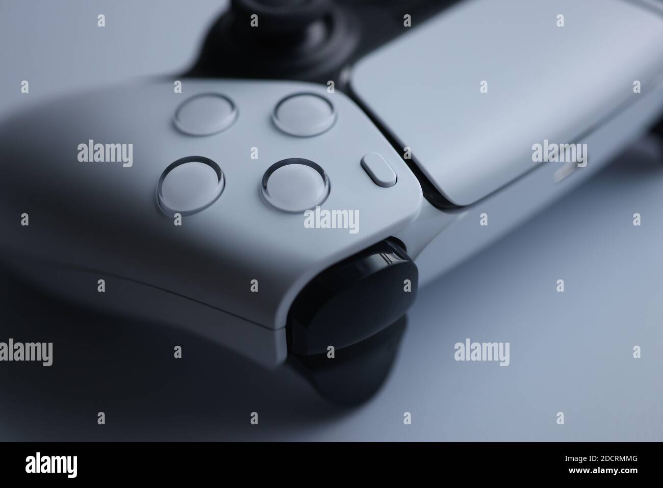 White modern game pad closeup background Stock Photo - Alamy