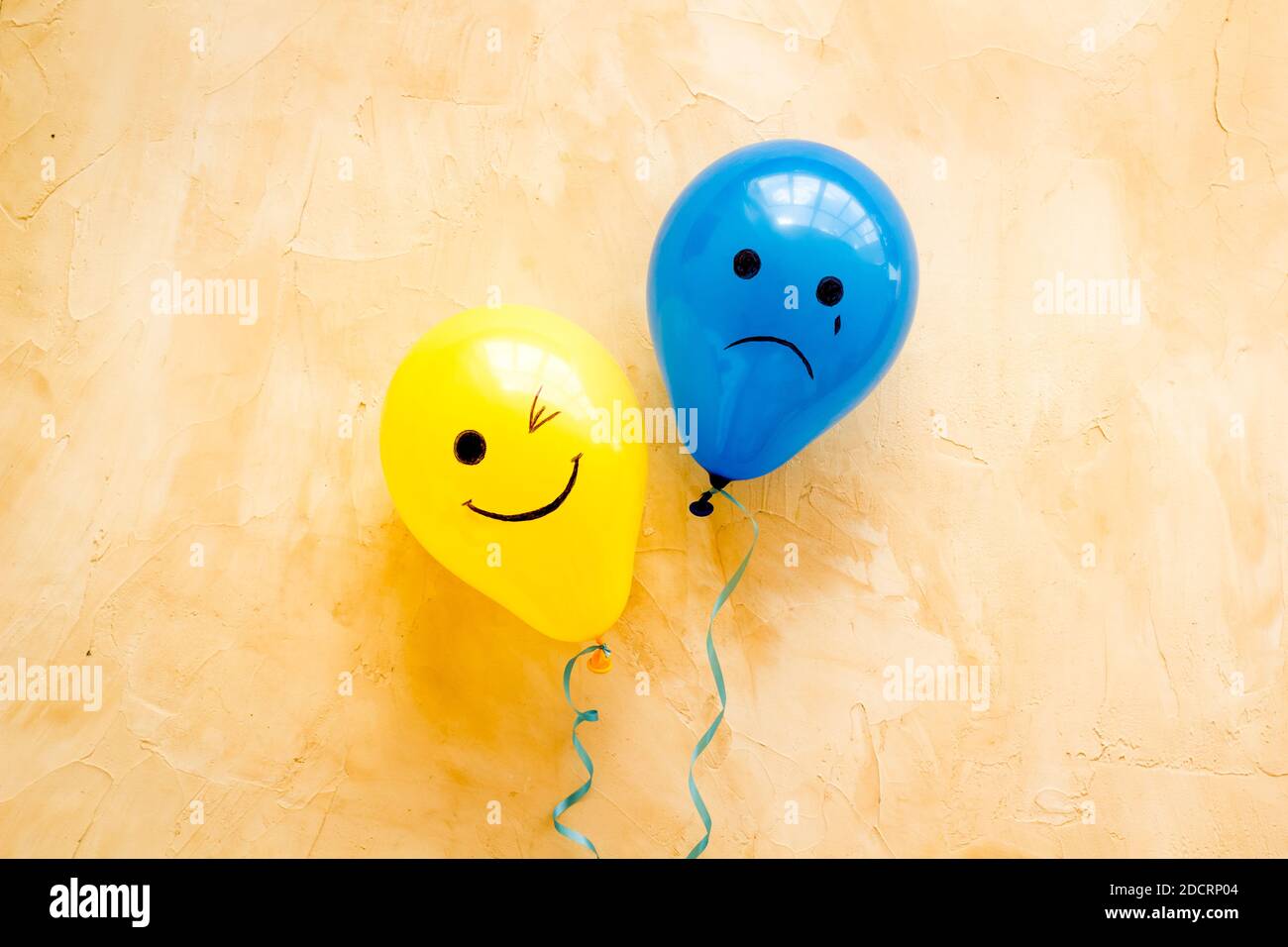 Positive and negative emotions background. Sad and happy faces on ...