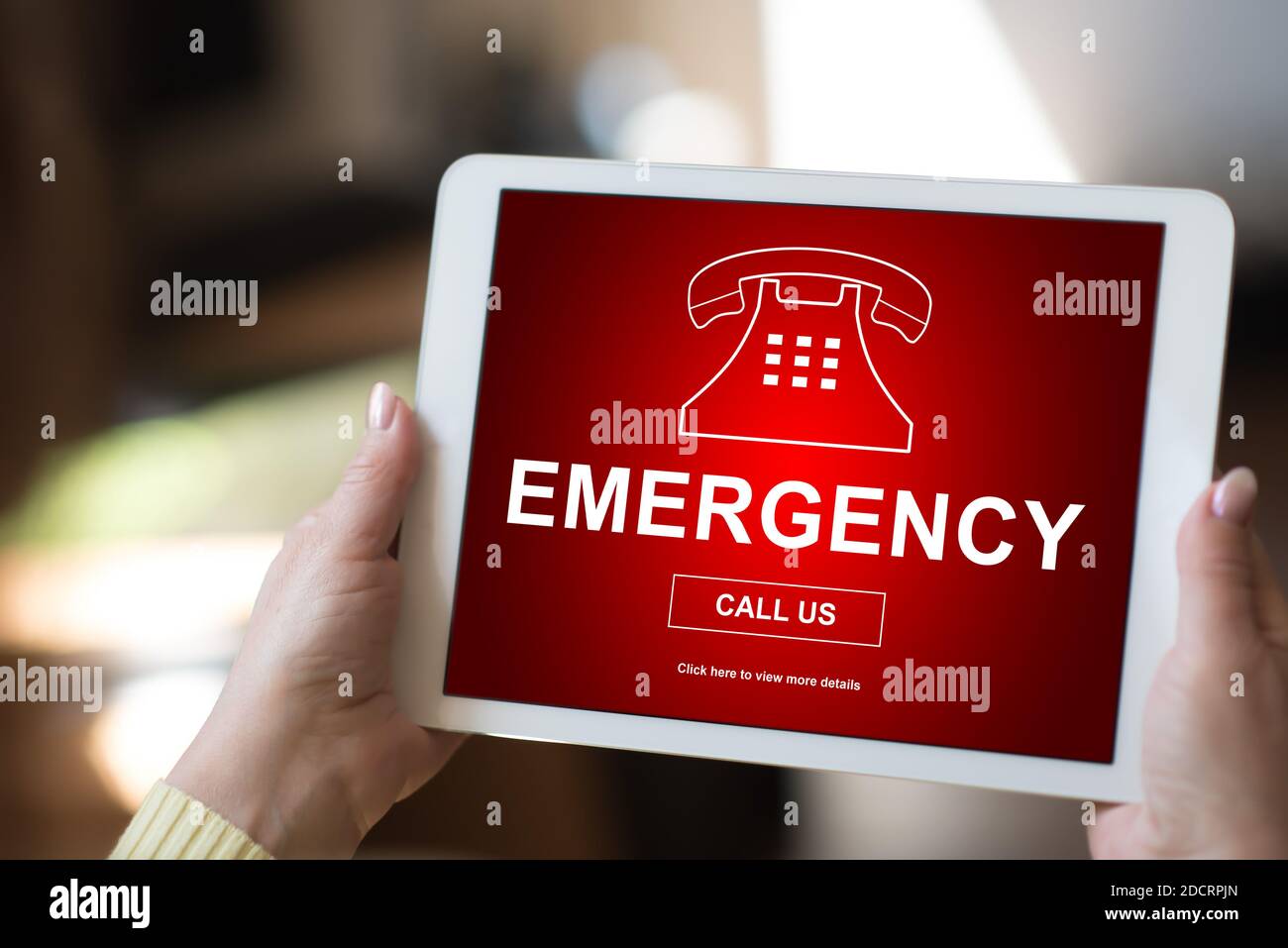 Tablet screen displaying an emergency concept Stock Photo - Alamy