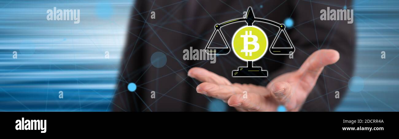 Bitcoin regulation concept above the hand of a man in background Stock ...