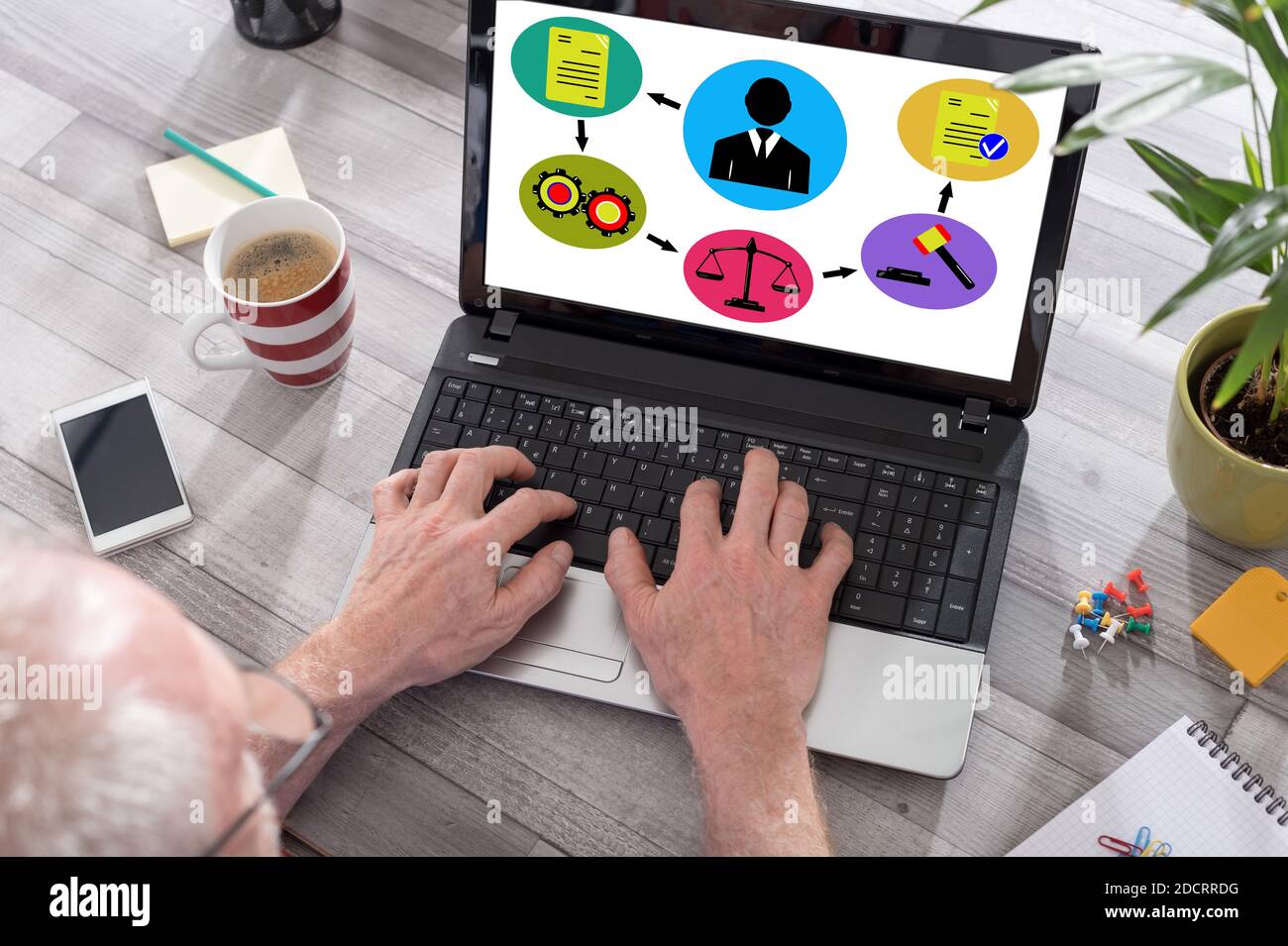 Document validation process concept shown on a laptop used by a man ...