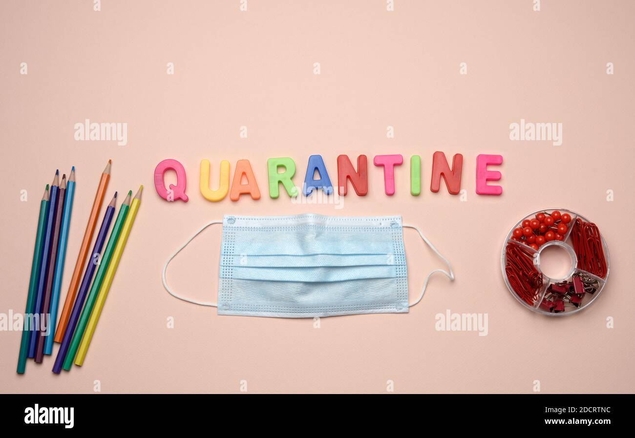 disposable medical mask and the inscription quarantine from plastic ...