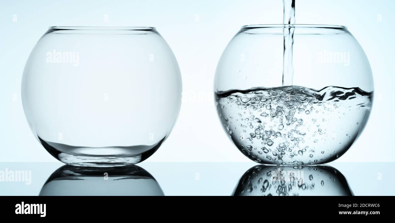 Empty fishbowl glass blue hi-res stock photography and images - Alamy
