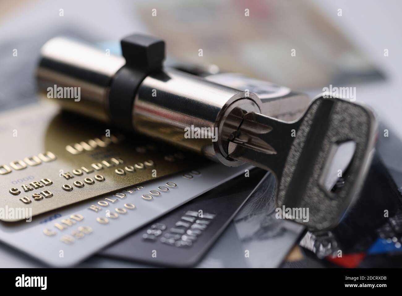 Plastic bank cards with lock with key Stock Photo - Alamy