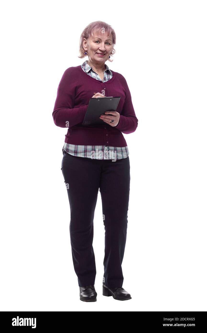 smiling adult woman signing a document. isolated on a white Stock Photo ...