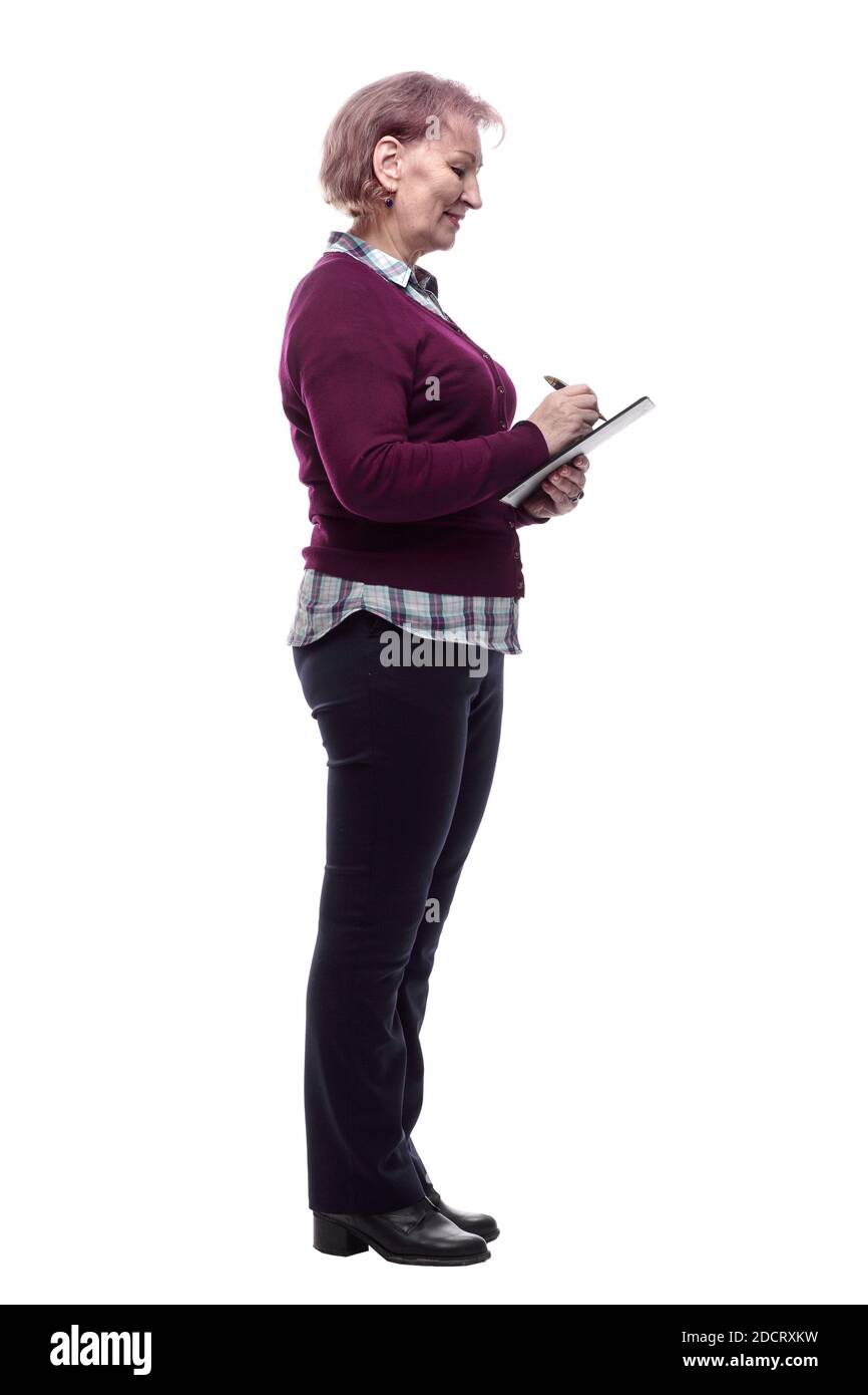 attentive adult woman signing a document. isolated on a white Stock ...