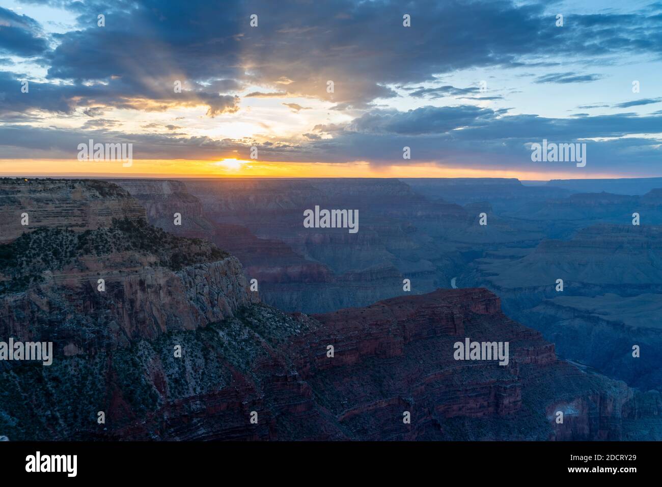 sunset shot of sunbeams extending upwards from behind clouds at hopi ...