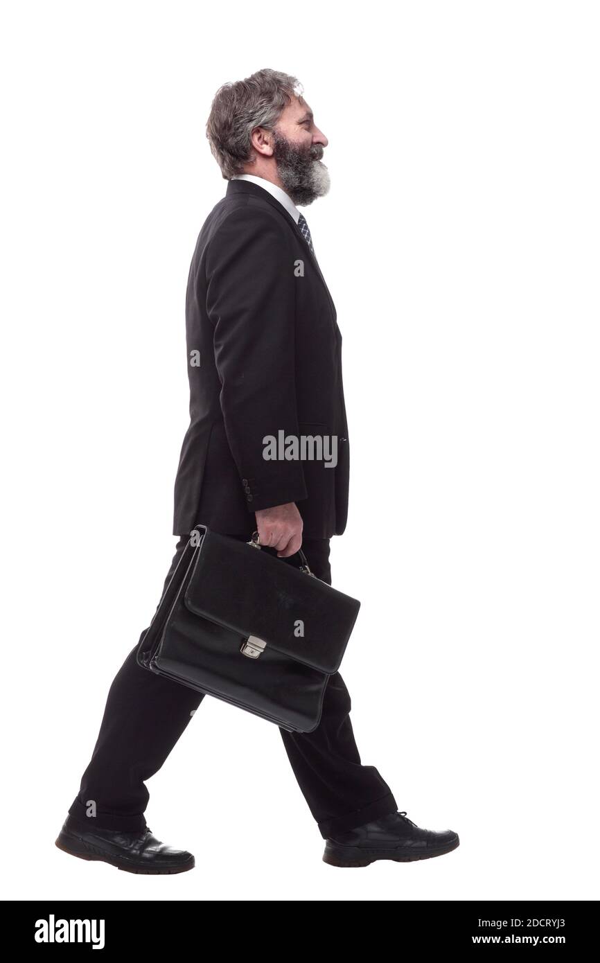 in full growth. smiling business man striding forward Stock Photo - Alamy