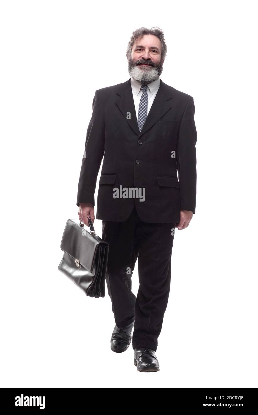 in full growth. smiling business man striding forward Stock Photo - Alamy