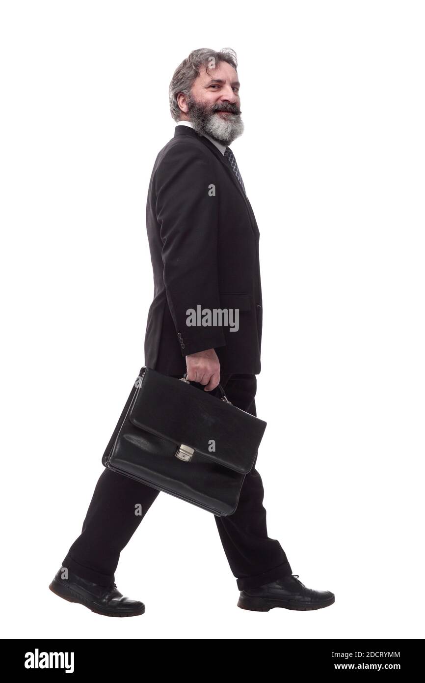 in full growth. smiling business man striding forward Stock Photo - Alamy