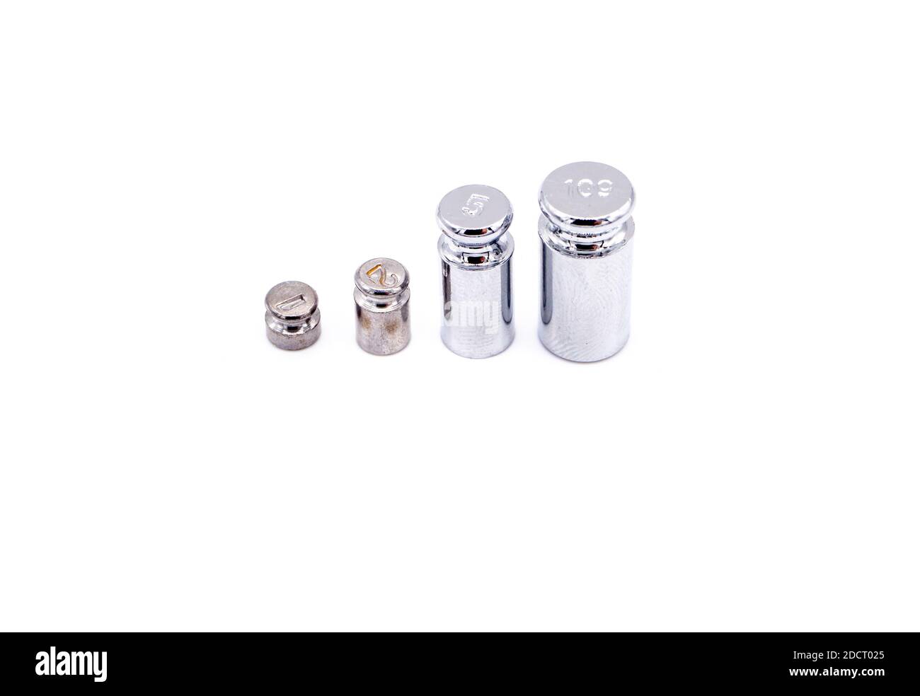 small weights isolated on white background Stock Photo - Alamy