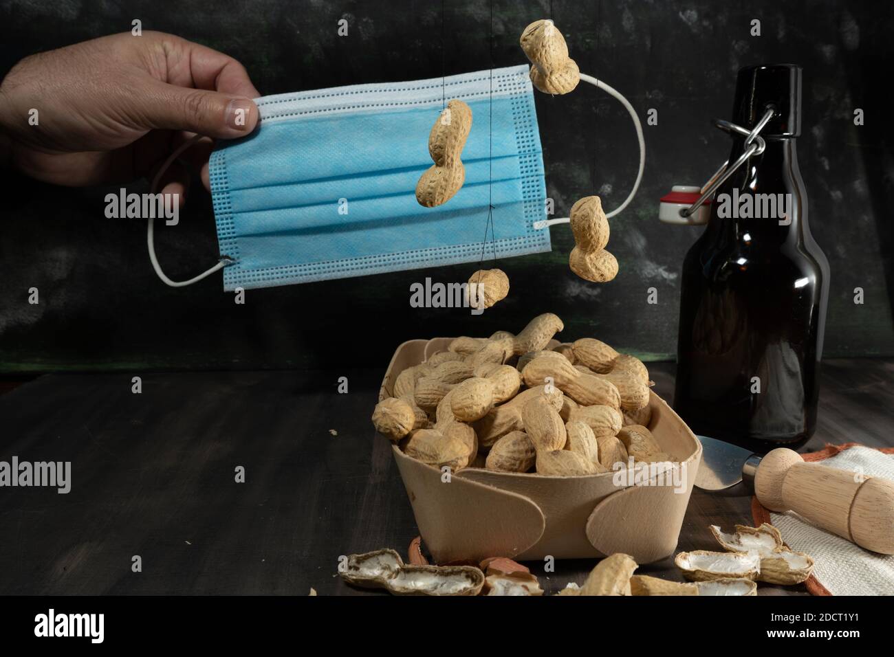 picture of a some peanuts come down to eat Stock Photo - Alamy