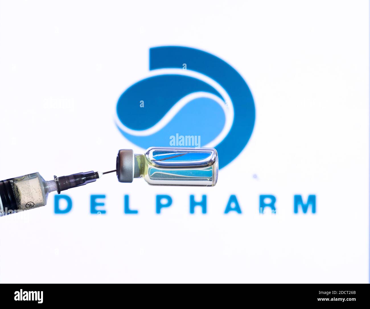 In this photoillustratn medical syringe an bottle of liquid is seen ...