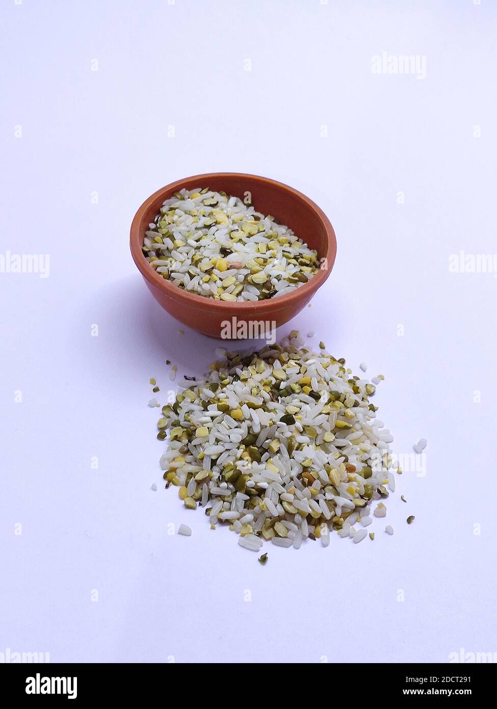 Different grains in the bowl, rice, moong beans, dal, mung dal, lentils ...