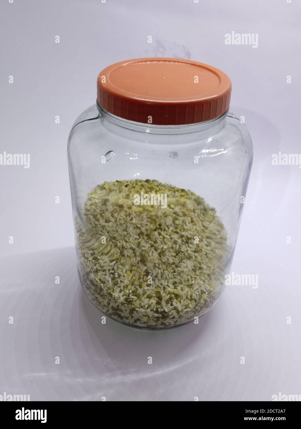 Different grains in the bowl, rice, moong beans, dal, mung dal, lentils ...