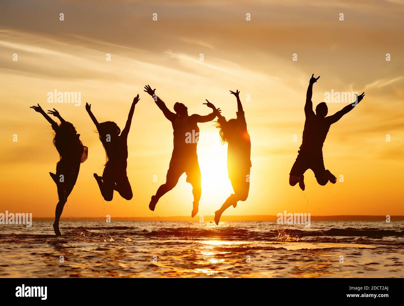 Jumping friends hi-res stock photography and images - Alamy