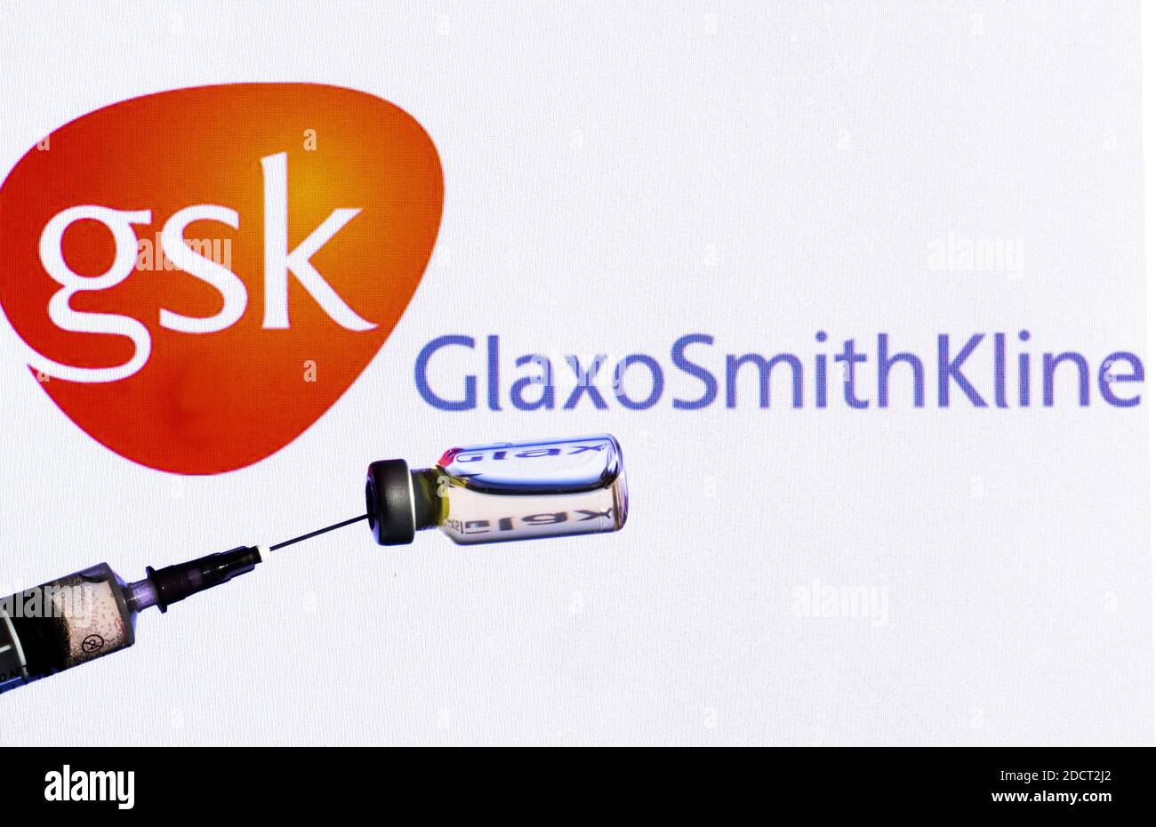 In this photoillustratn medical syringe an bottle of liquid is seen ...