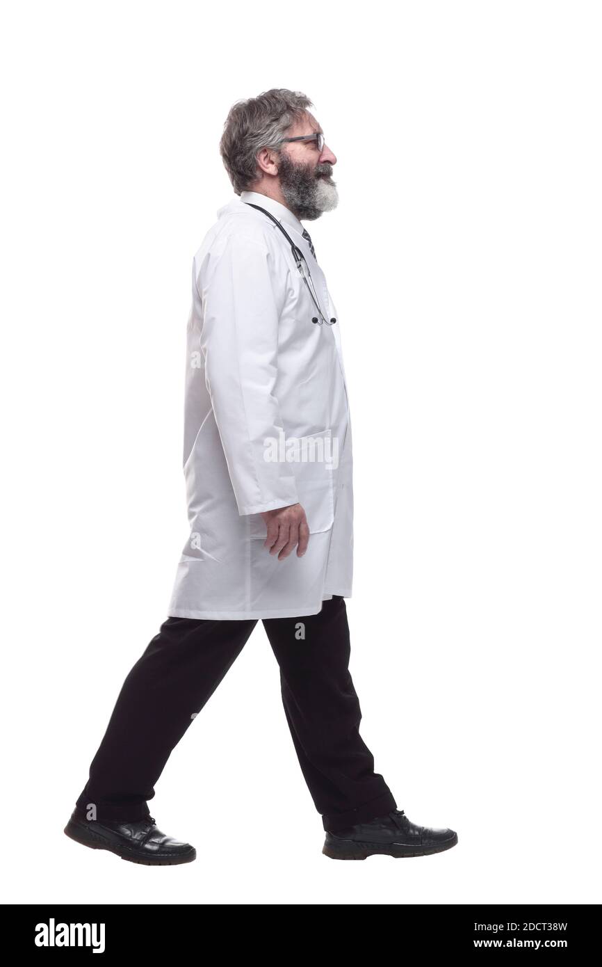 in full growth. confident male doctor striding forward Stock Photo - Alamy