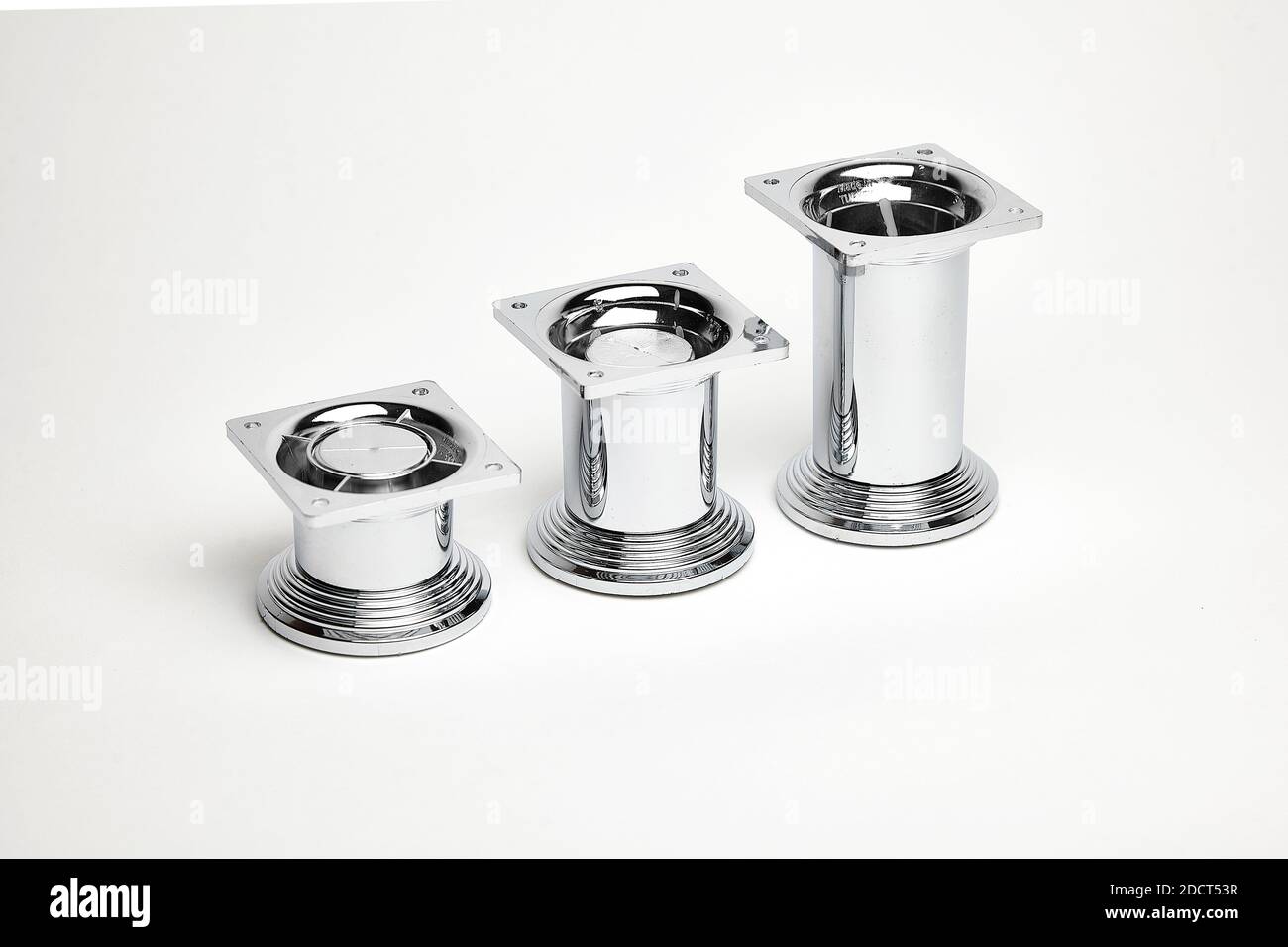 Legs for furniture and cabinet in silver metallic color Stock Photo - Alamy