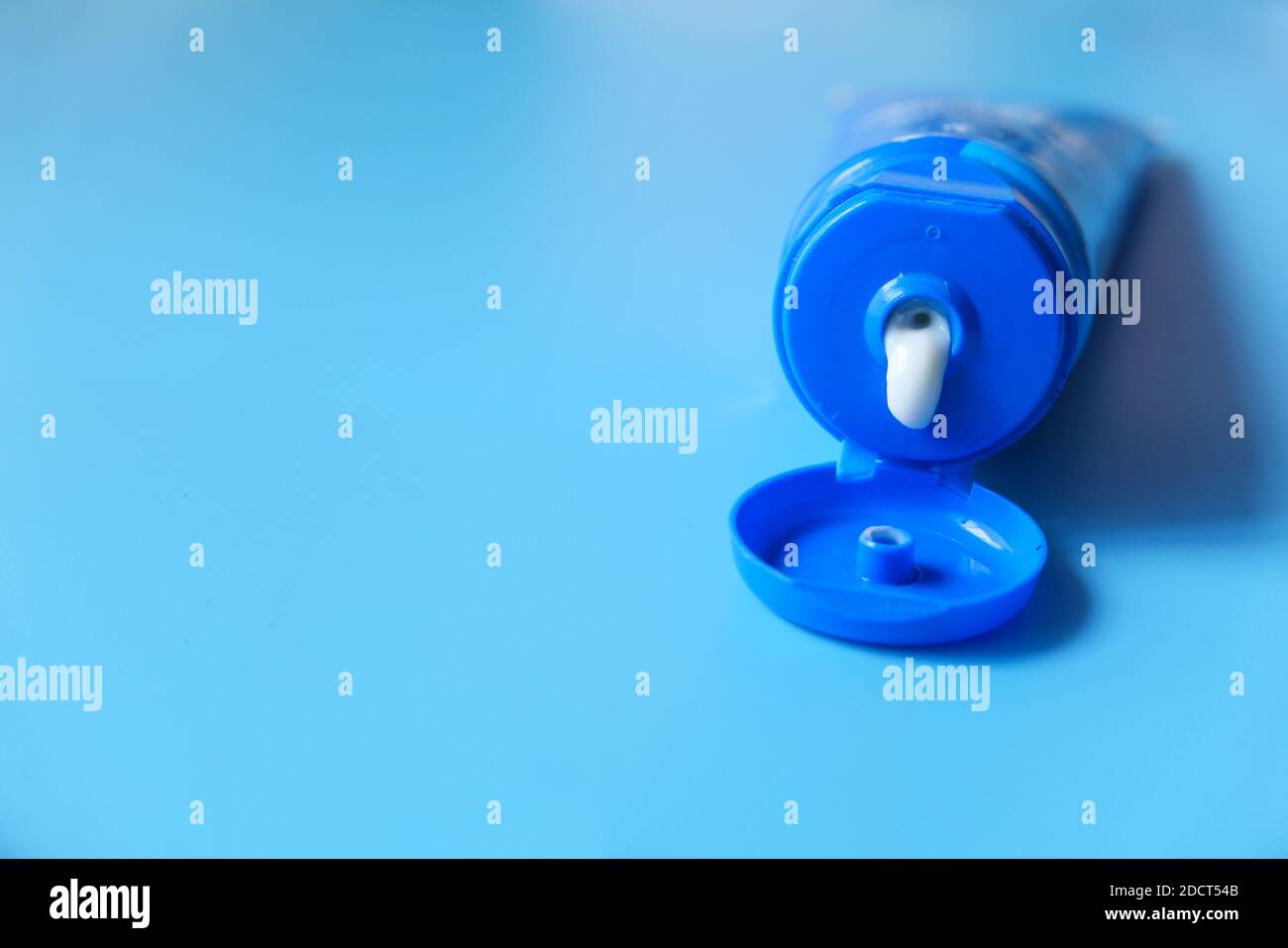 Close up of face cream in a container on blue background Stock Photo ...