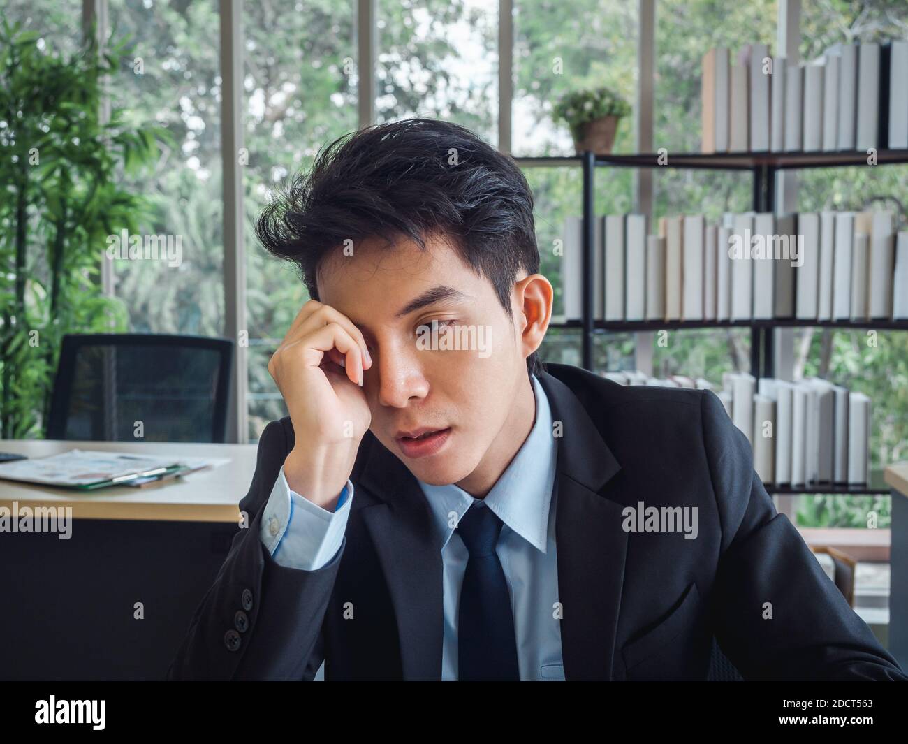 Boring man in suit hi-res stock photography and images - Alamy
