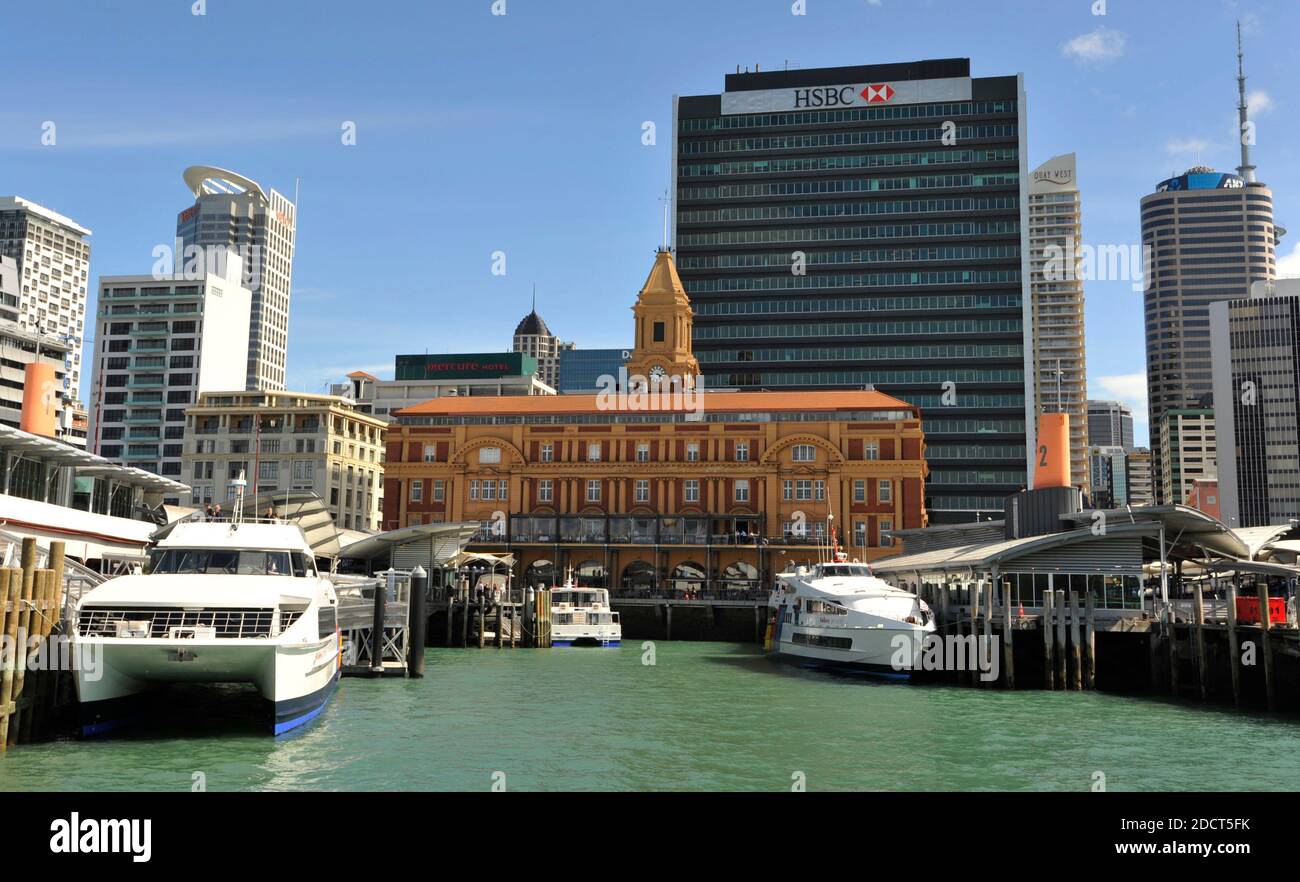 Historic Auckland ferry terminal building in the central business ...