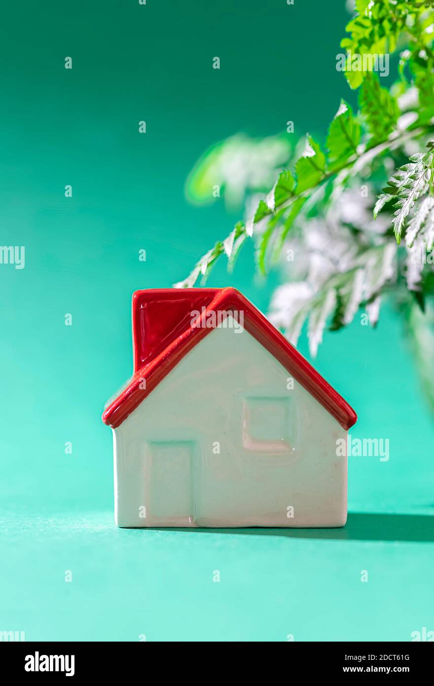 Miniature red house. Dream house concept, real estate investment ...