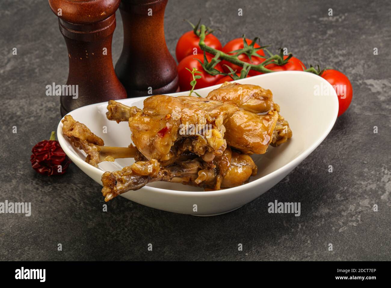 Rabbit stew in sweet and spicy sauce Stock Photo - Alamy