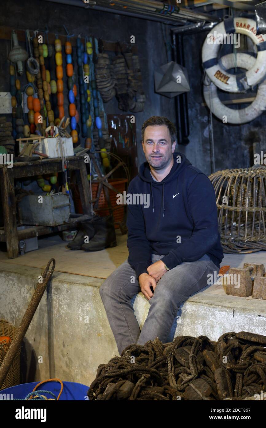 England / Cornwall / St. Ives / Artist Sam Bassett posing in the he ...