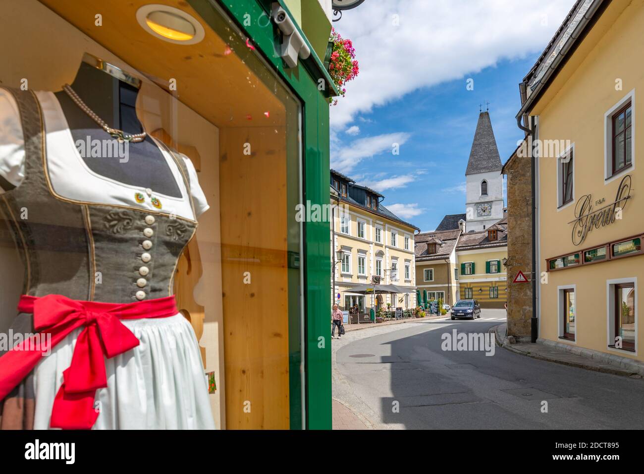 View of colourful clothes shop and main street in Bad Aussie, Styria ...