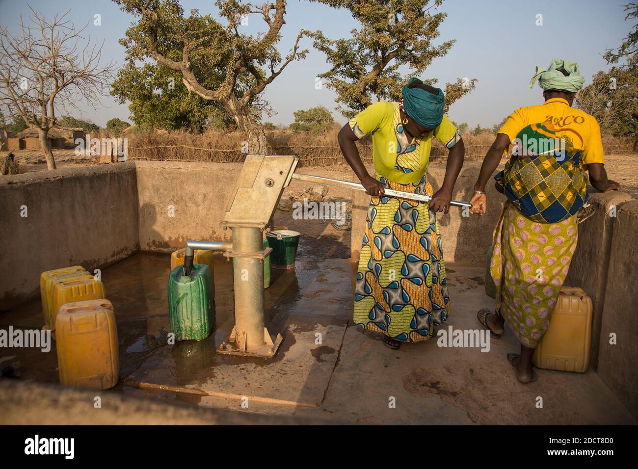Collecting water, Burkina Faso, Africa Stock Photo - Alamy