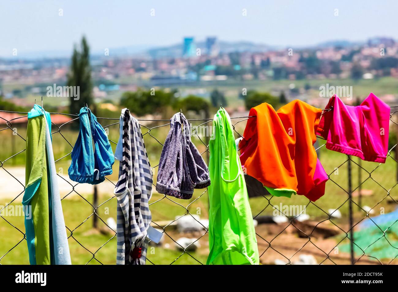 Laundry hanging on fence hi-res stock photography and images - Alamy