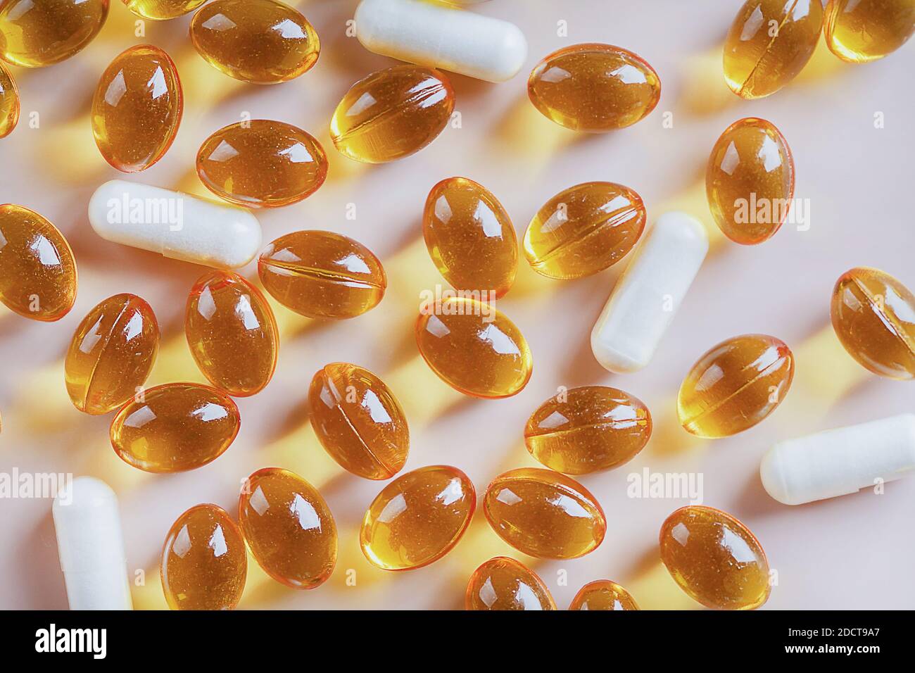 Variety of vitamin pills on beige background, supplemental and ...