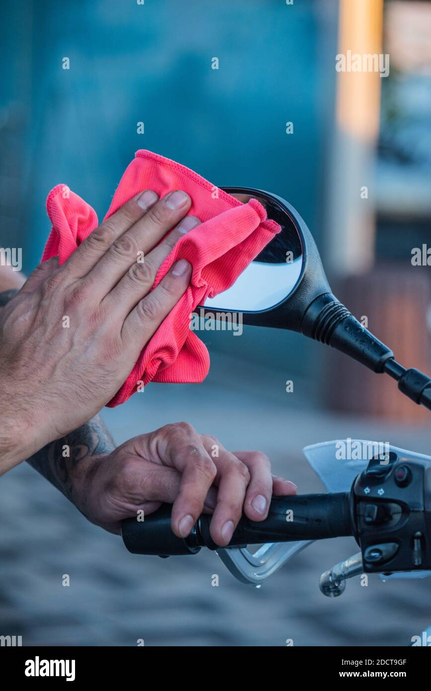 Motorcycle Car Wash. A series of photos a biker washes his motorcycle ...