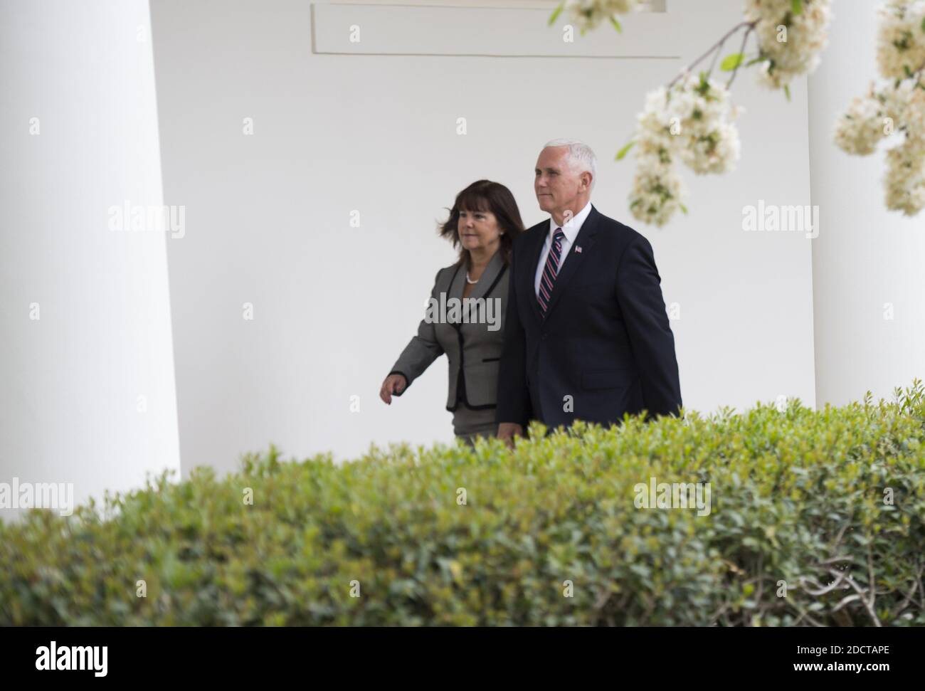 US Vice President Mike Pence and His wife walk to the Oval Office prior ...