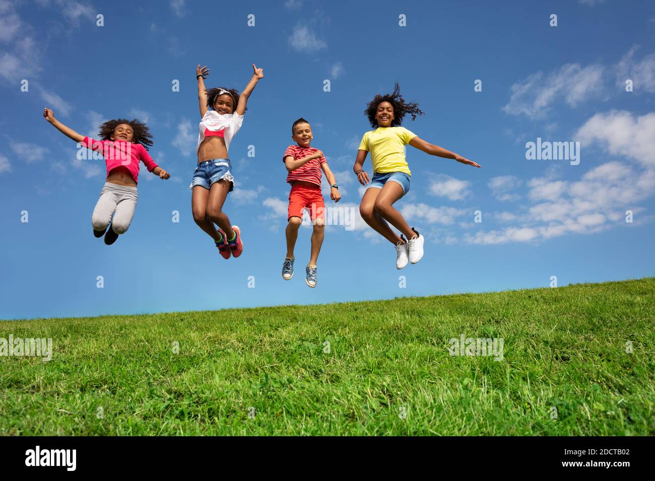 Healthy children funny jumping hi-res stock photography and images - Alamy