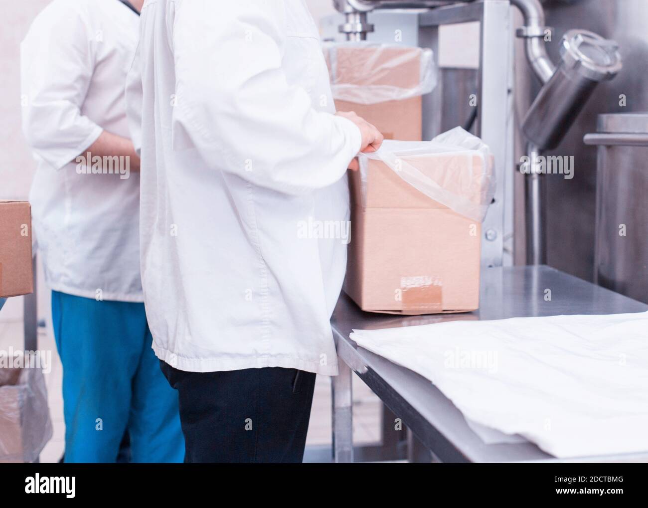 Employees at the enterprise inspect products for quality control in ...