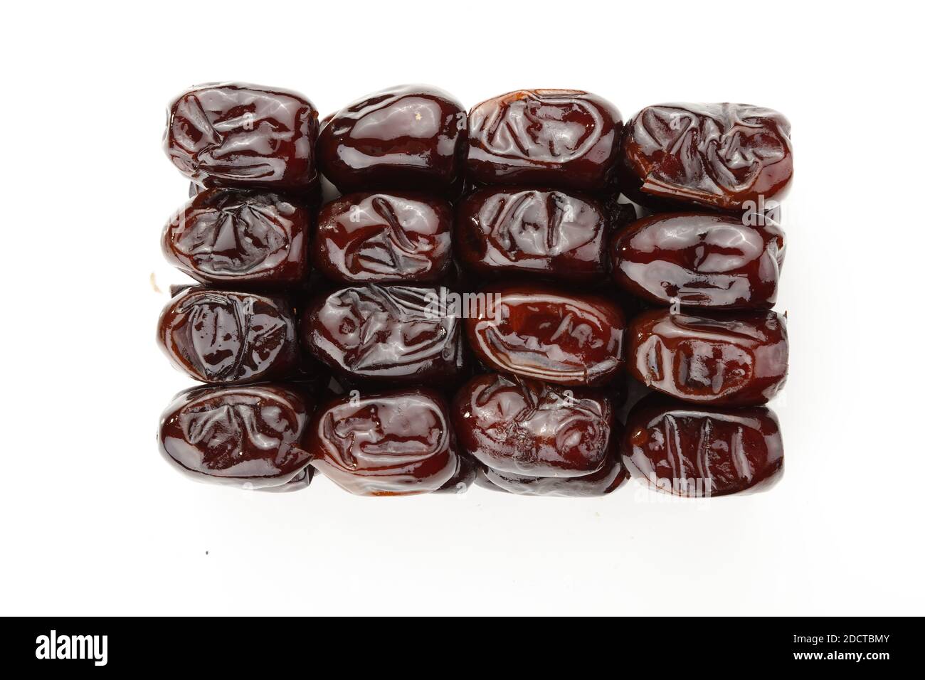 Date fruit isolated on white background Stock Photo - Alamy