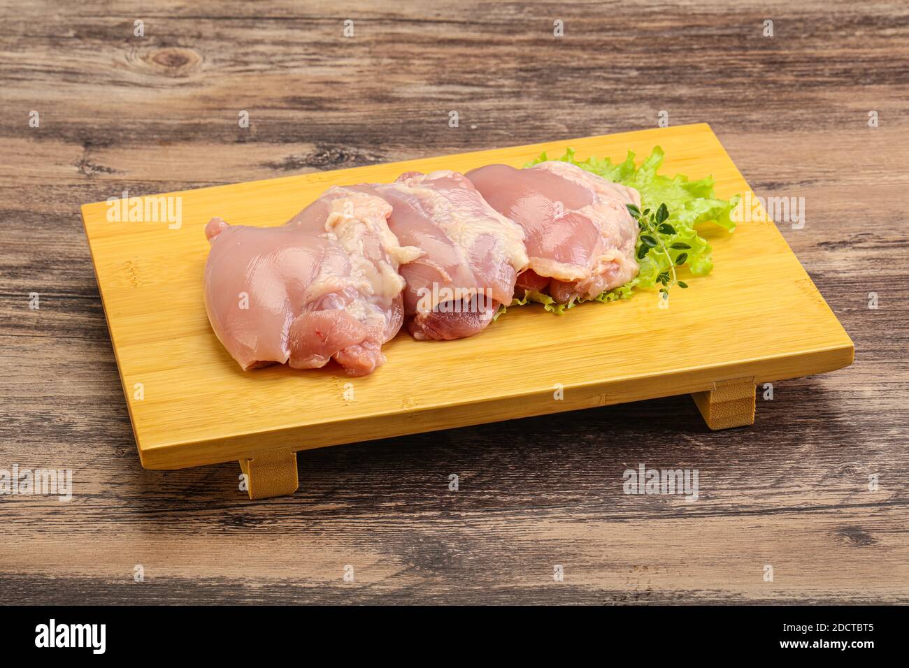 Raw chicken boneless and skinless leg for cooking Stock Photo - Alamy