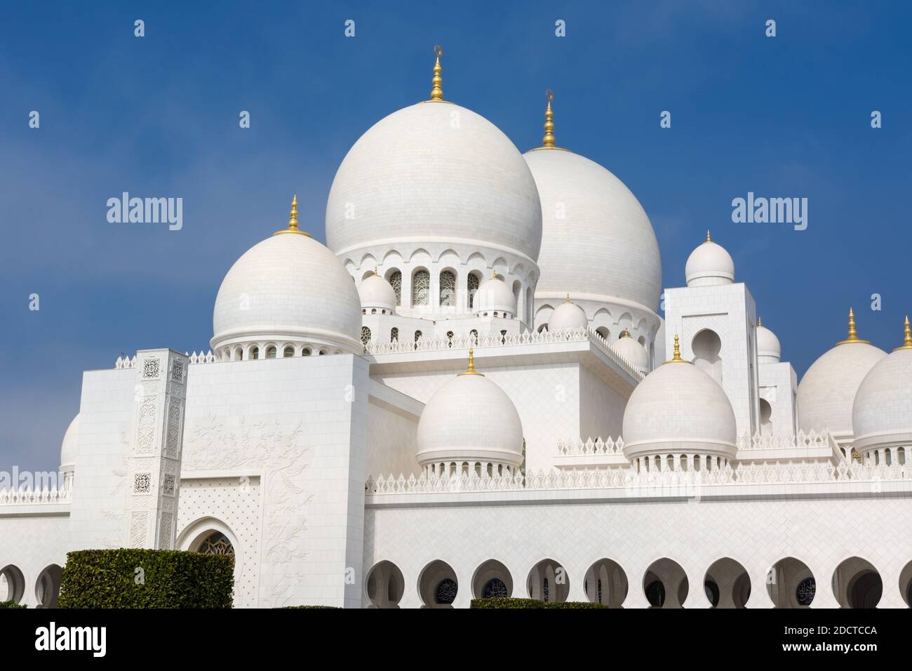 Domes of White Grand Mosque built with white marble stone, also called ...