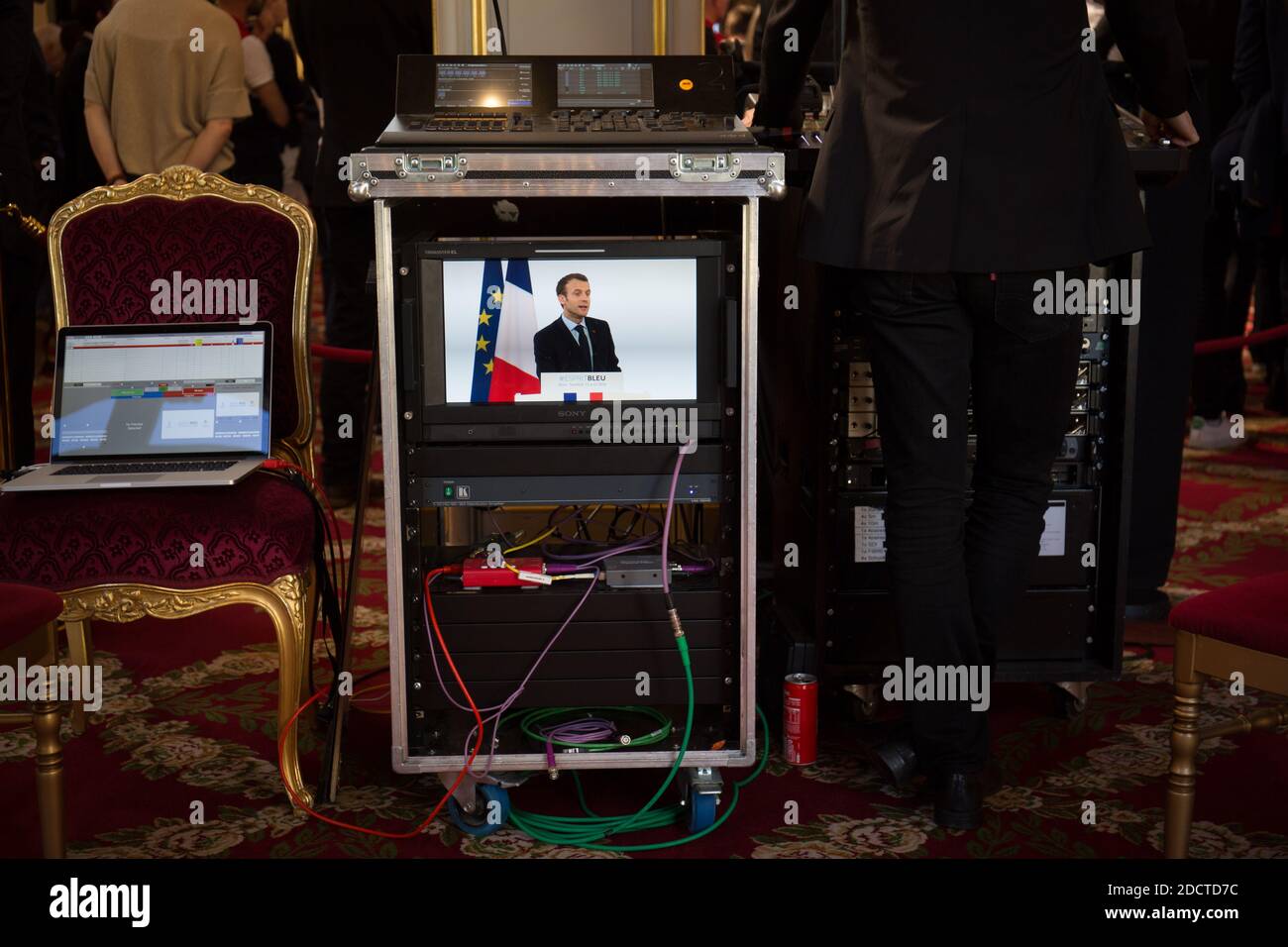 French President Emmanuel Macron receives during an award ceremony ...