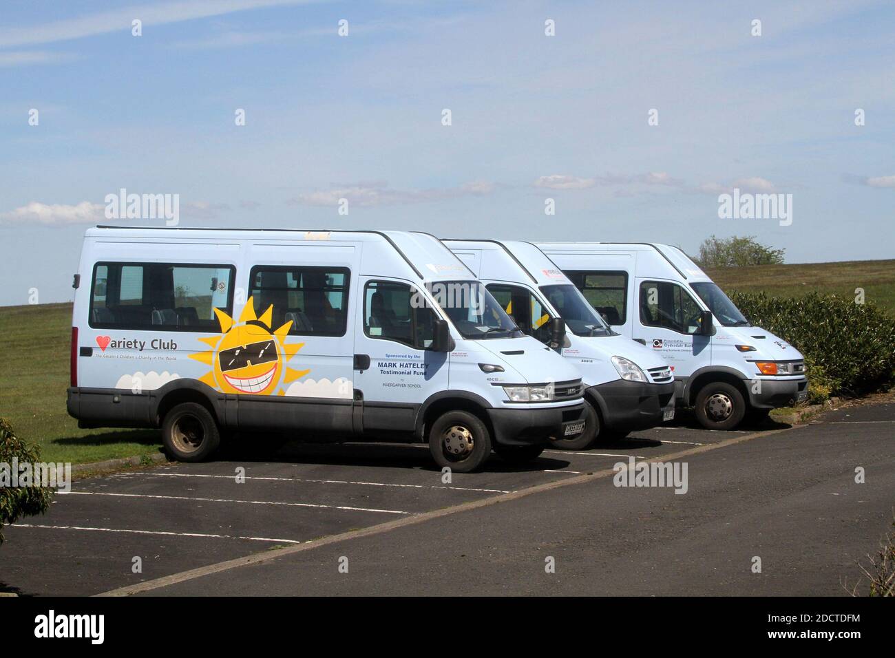 Three Variety Club Iveco mini bus Sunshine coach Stock Photo - Alamy