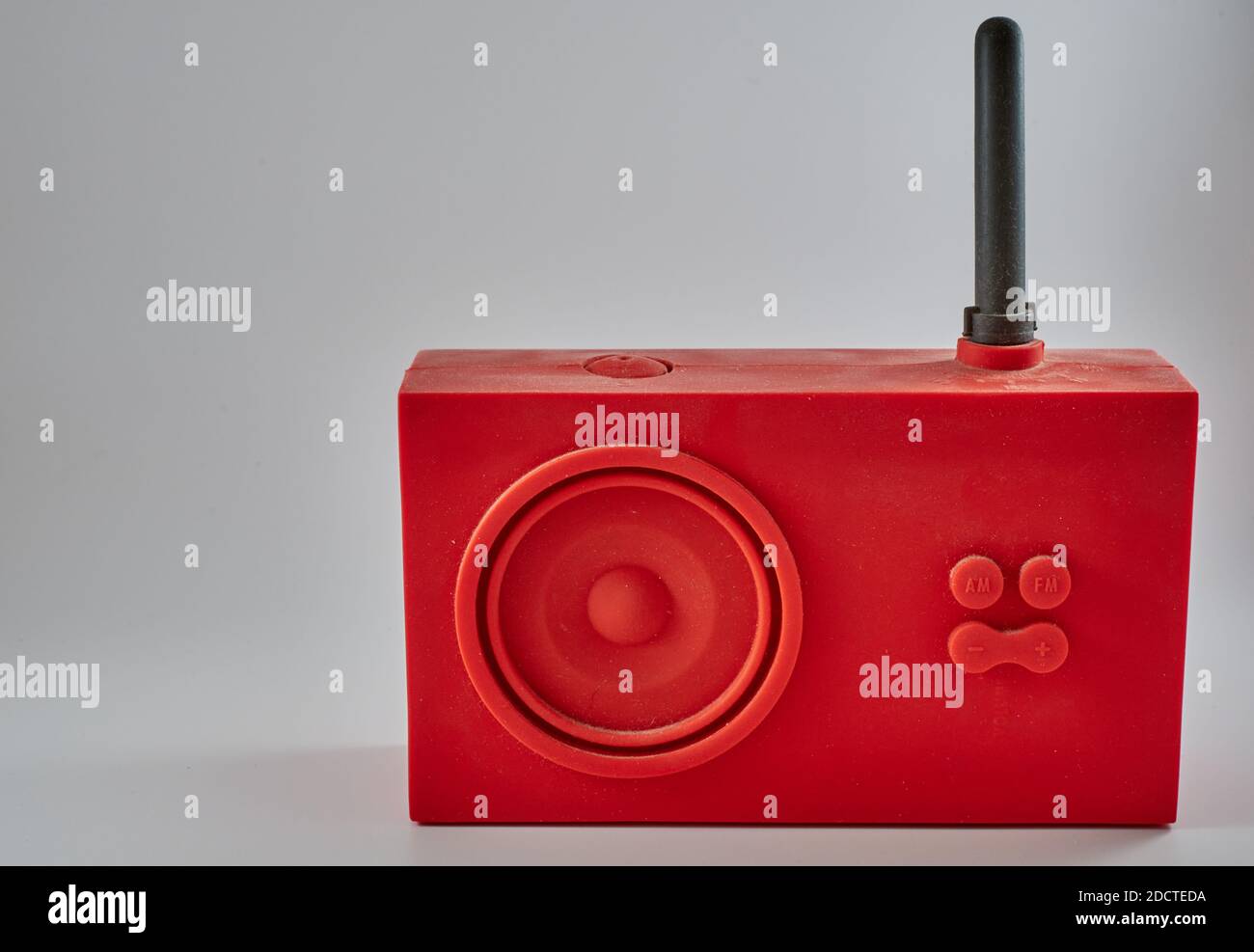 Red radio receiver on color white background Stock Photo - Alamy