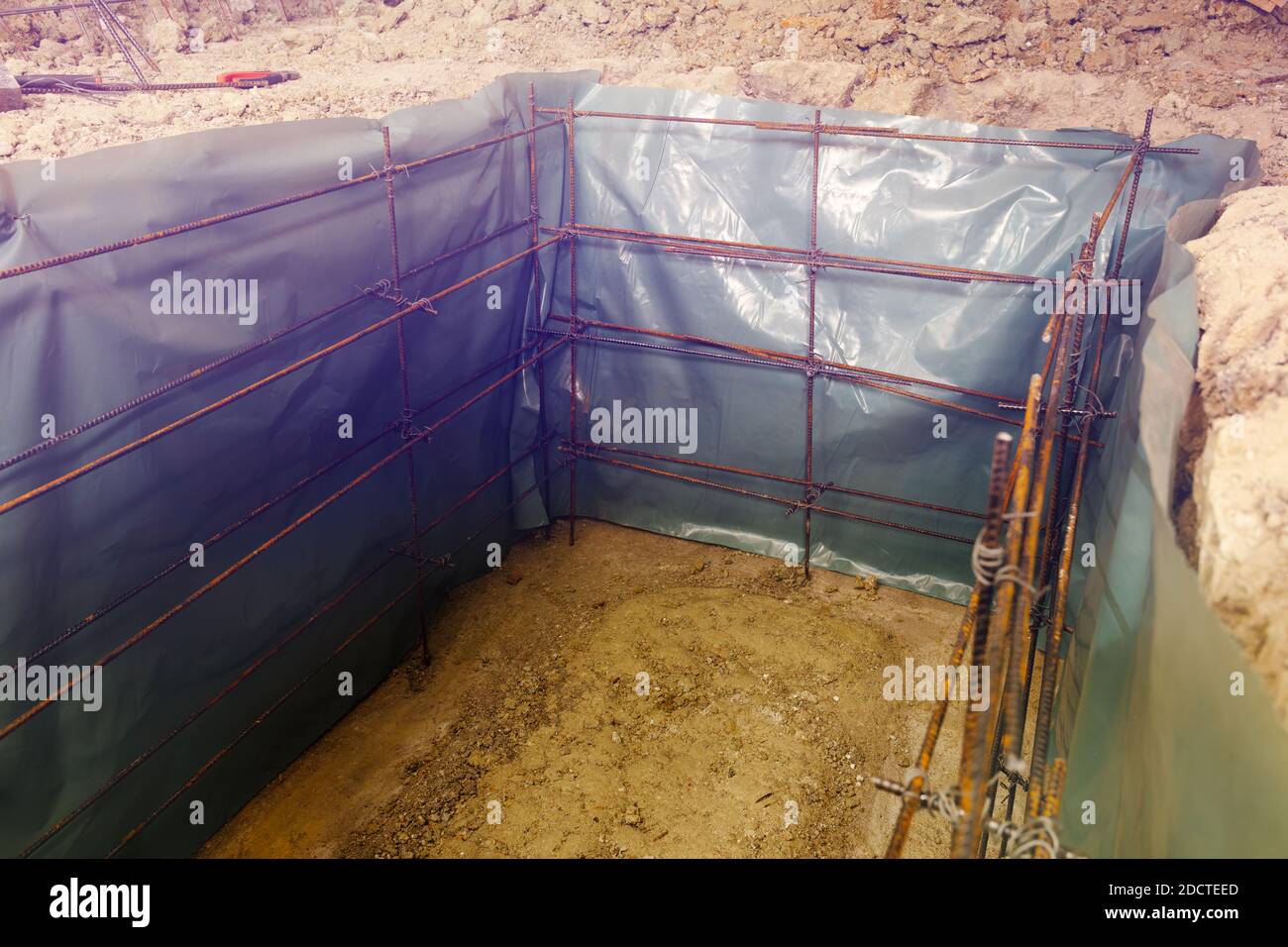 Framework of metal bars prepared for cellar basement concrete pouring ...