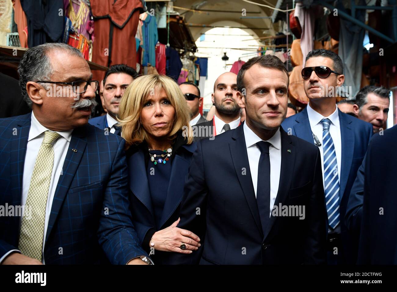 French President Emmanuel Macron (C-R) and his wife Brigitte (C-L) tour ...
