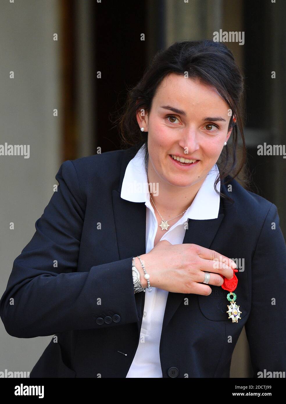 Paraolympic Marie Bochet poses at the front door of the Elysee ...