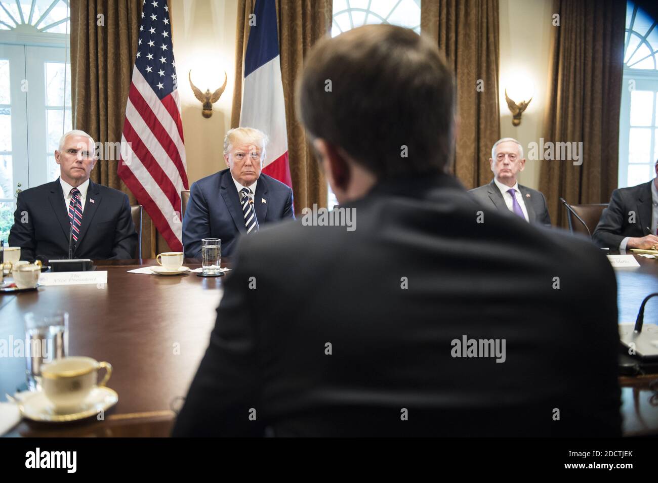 US President Donald Trump speaks with French President Emmanuel Macron ...
