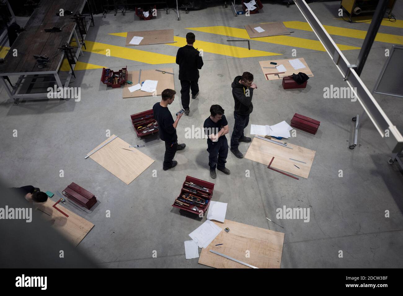 Apprentices work during a visit to an apprentice training center ...