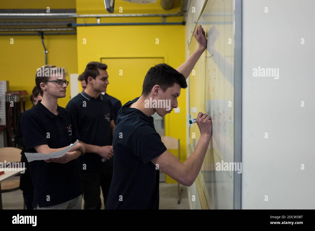 Apprentices work during a visit to an apprentice training center ...