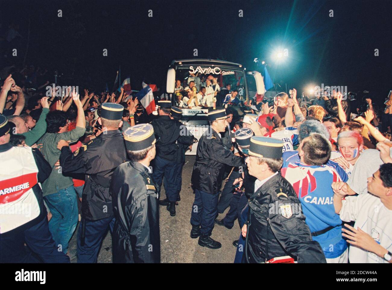France team's bus is surrounded by fans after the FIFA football world ...